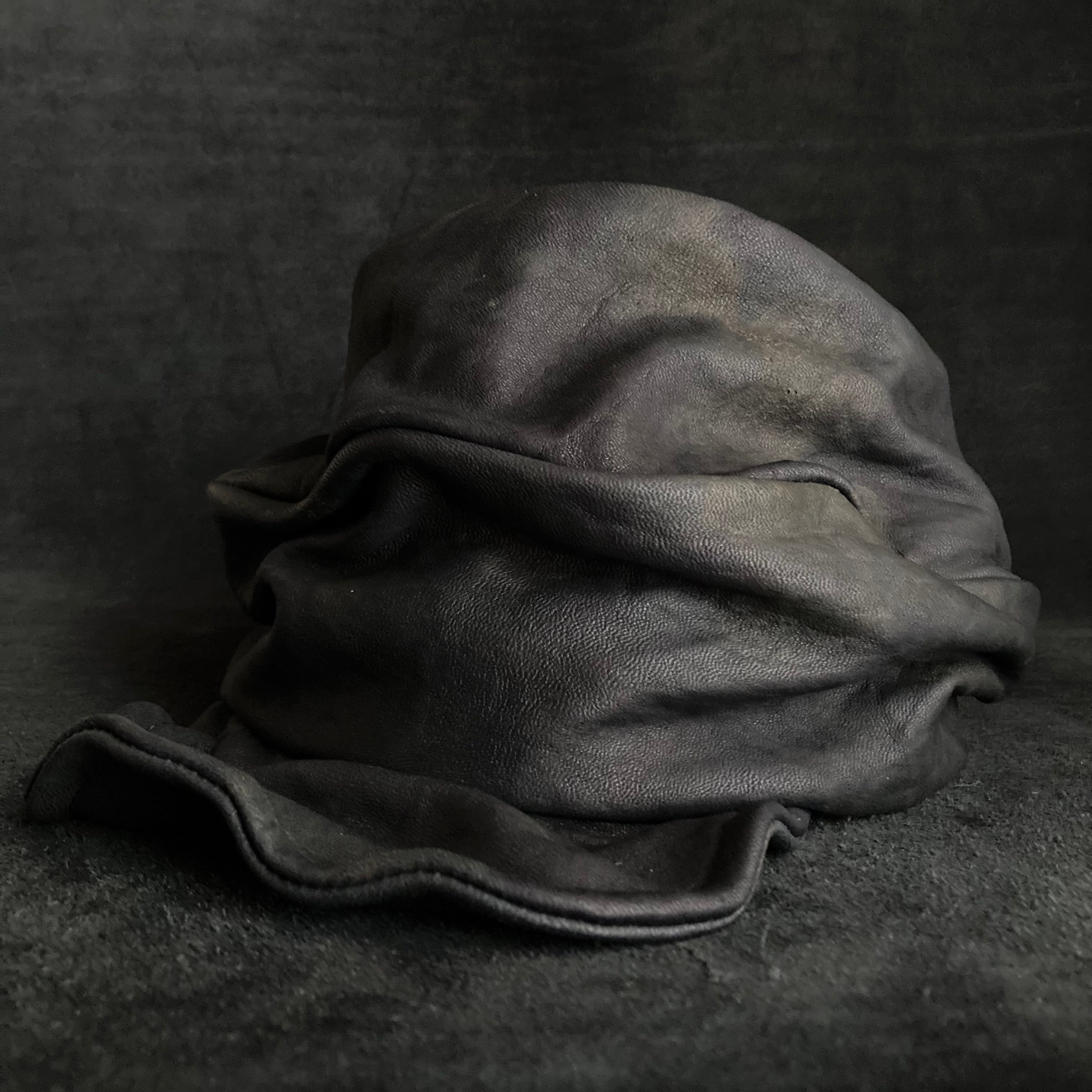 Old black leather turn cap – triangles hat