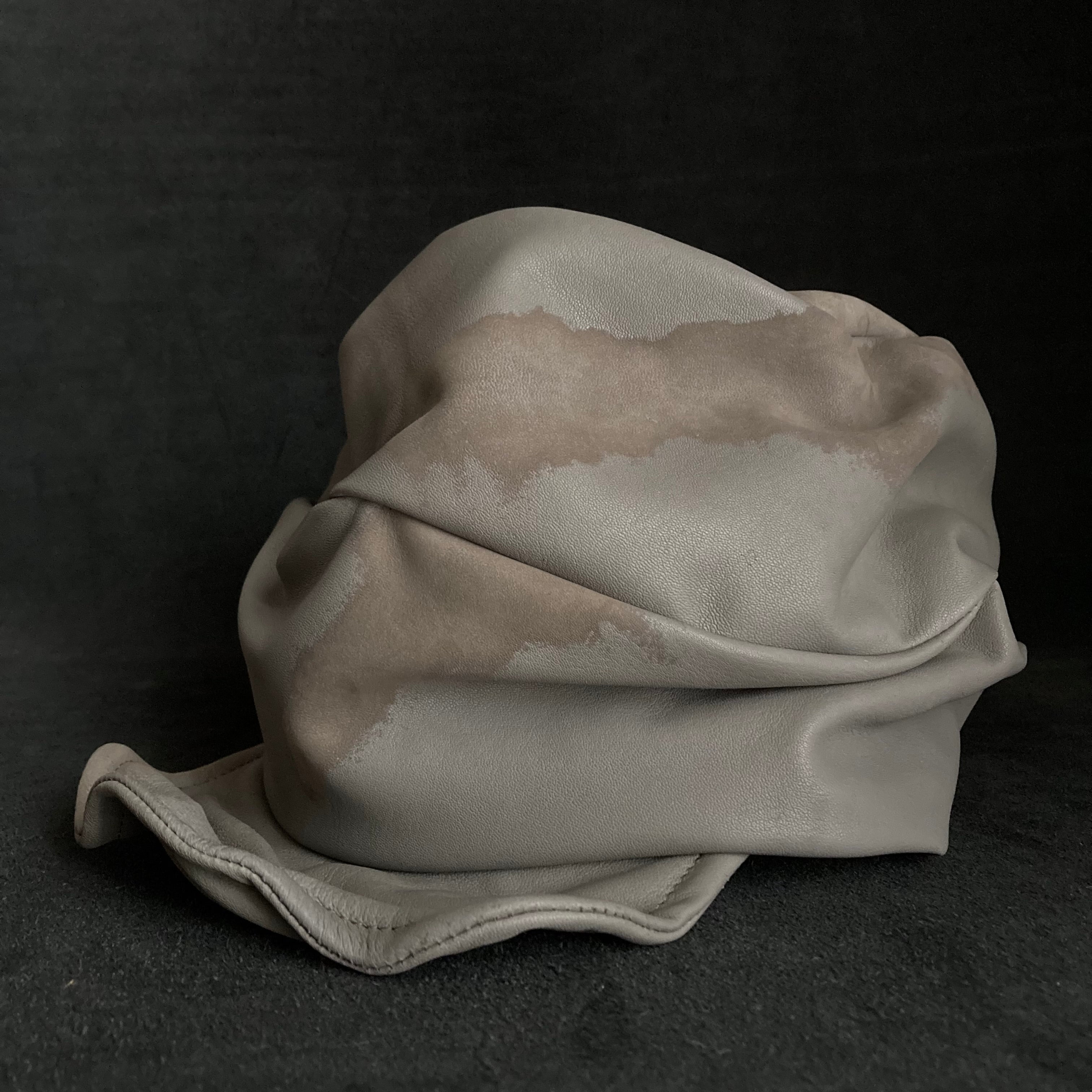 Marks of scratches light gray leather turn cap – triangles hat