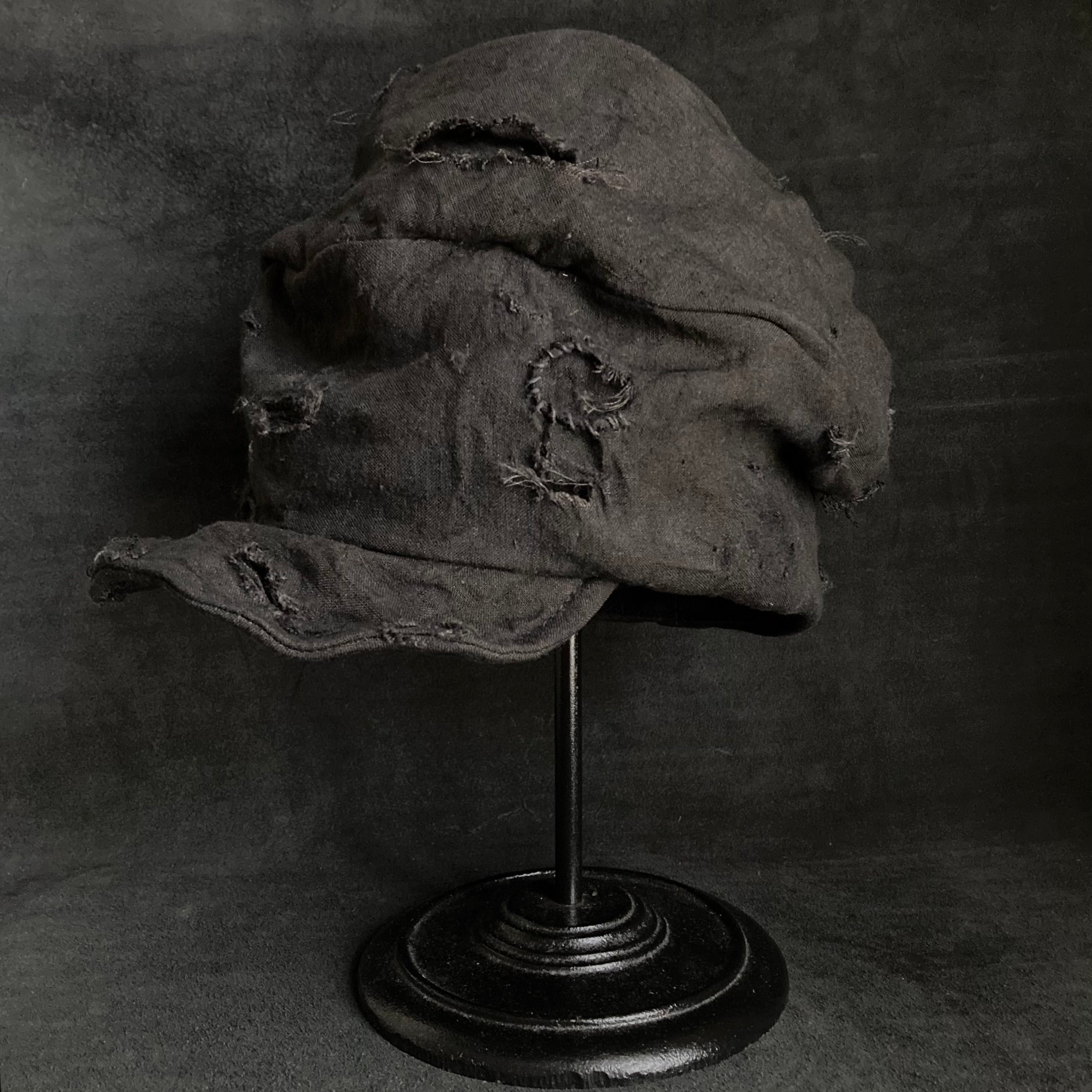 Thin black linen tattered turn cap – triangles hat
