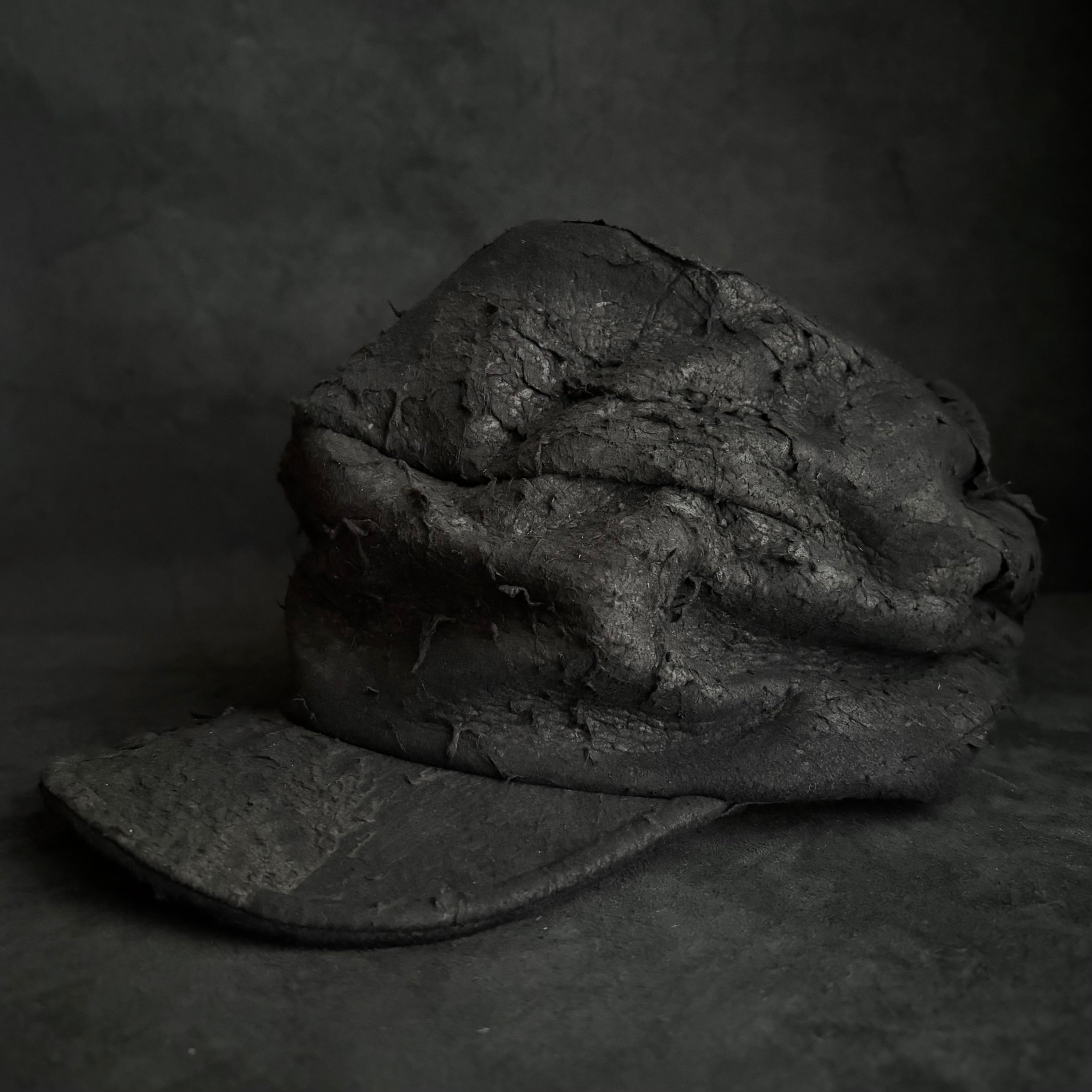 Floor under black leather turn cap (brim core) – triangles hat