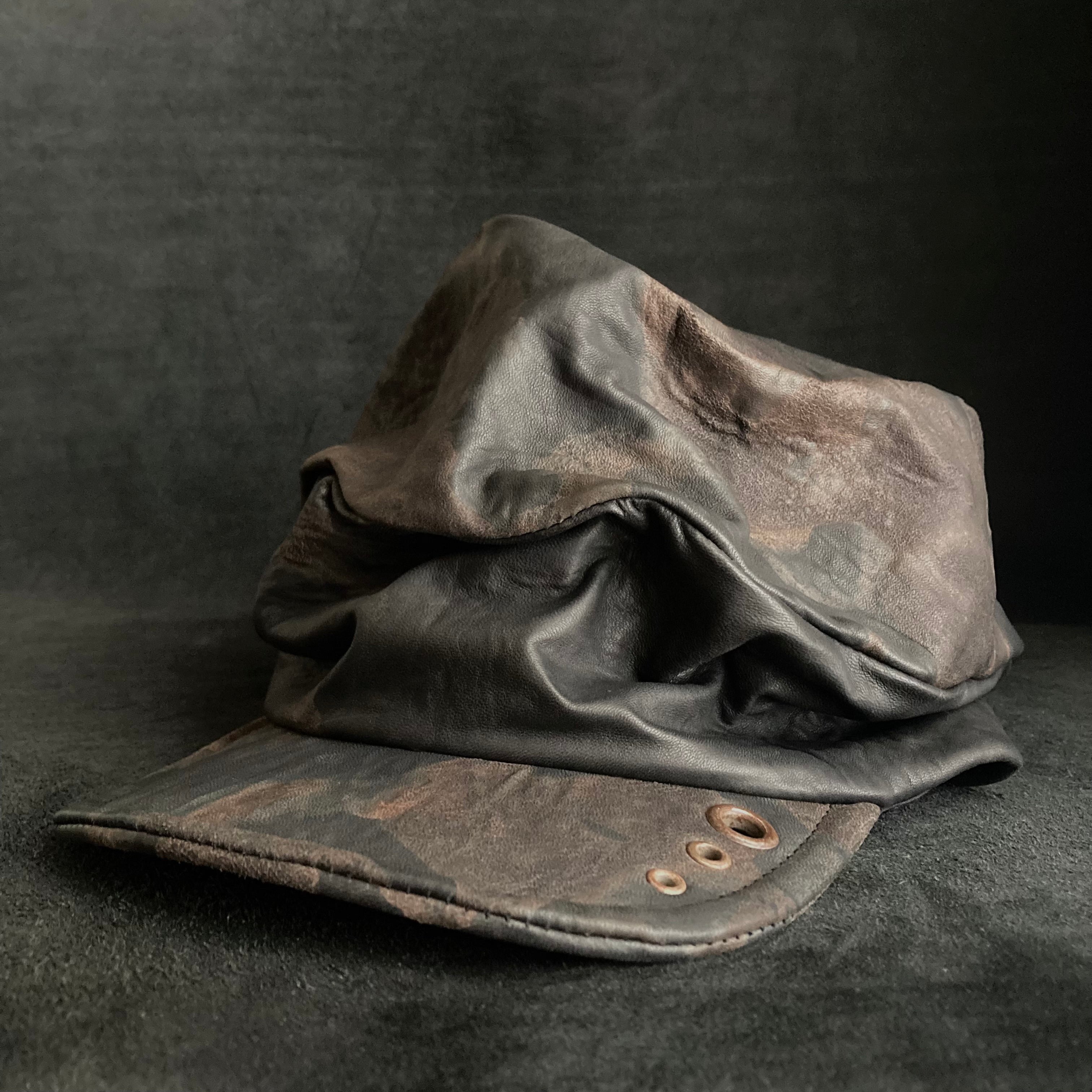 Discolored rusty leather turn cap – triangles hat